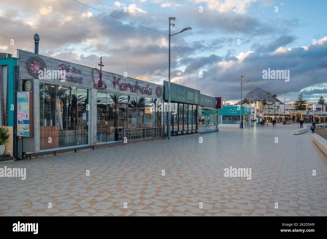 JAVEA (XABIA), SPAIN - JANUARY 25, 2022: Shops and restaurants on the ...