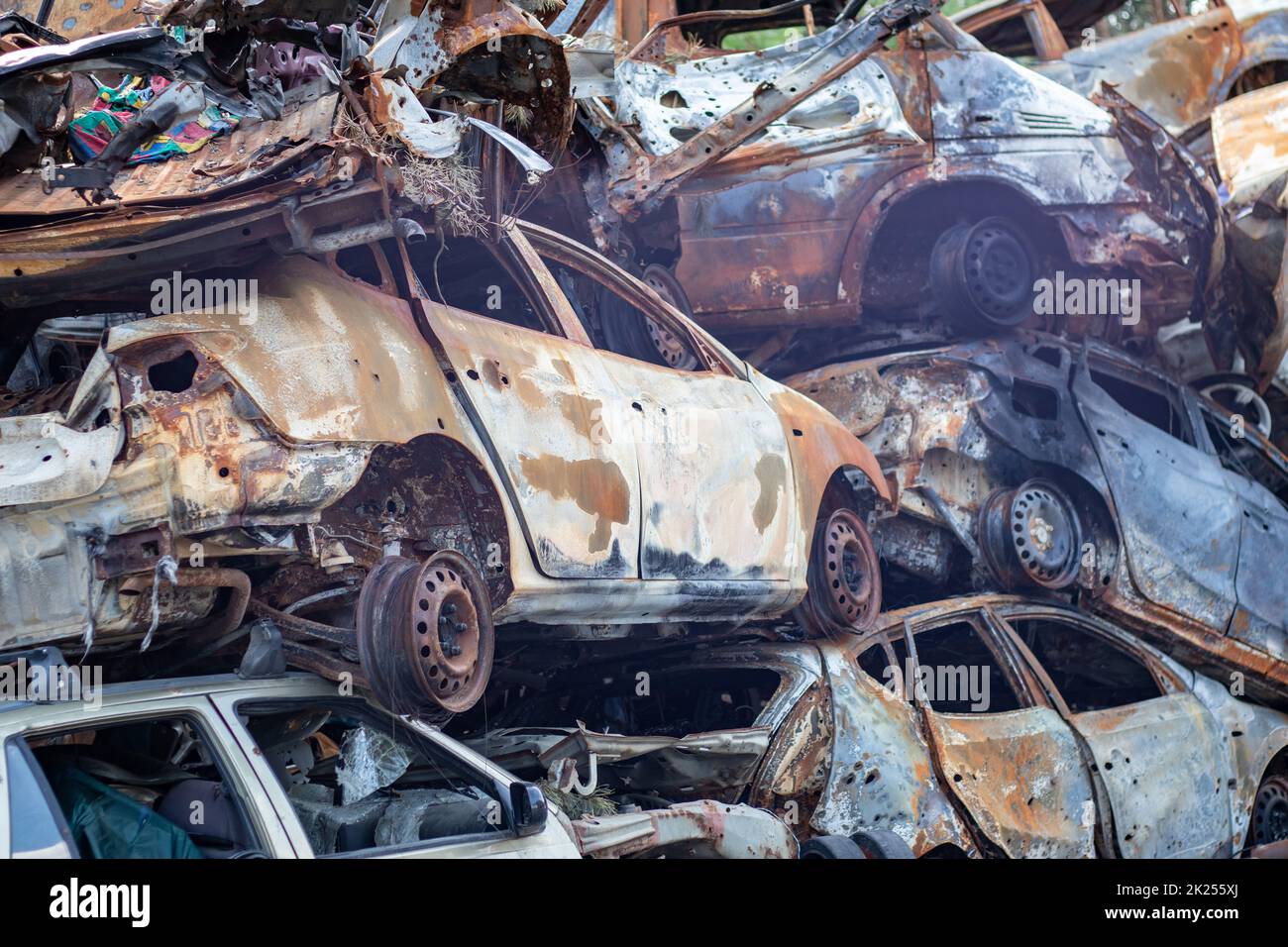 Russian invasion of Ukraine in 2022, destroyed and burned cars. Cars ...