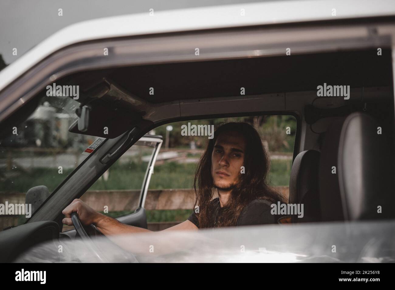 young girl smiling with camera slung over her shoulder Stock Photo - Alamy