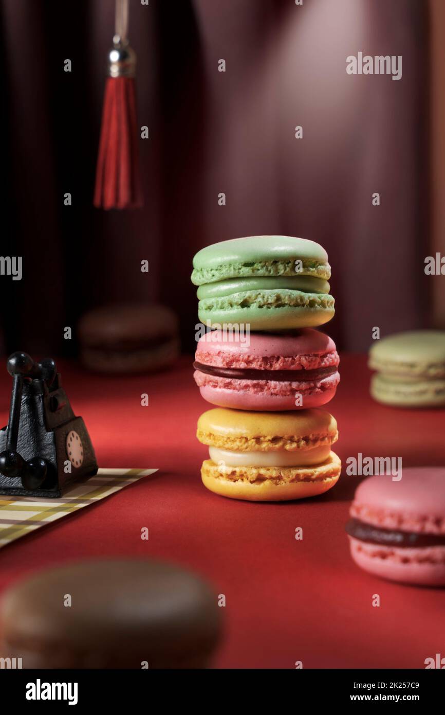 Stack of colored macaroons with different flavors - pistachio ...