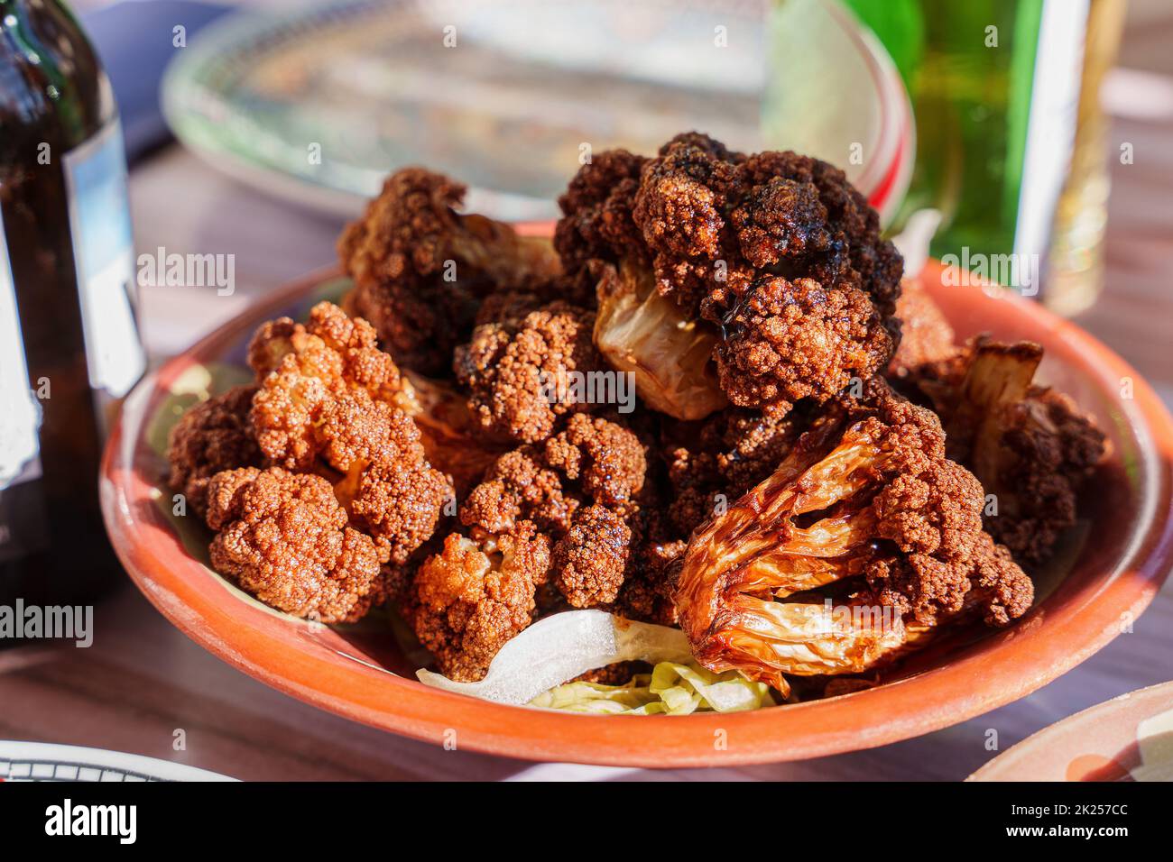Traditional Middle Eastern dish. Appetizer of baked cauliflower and ...
