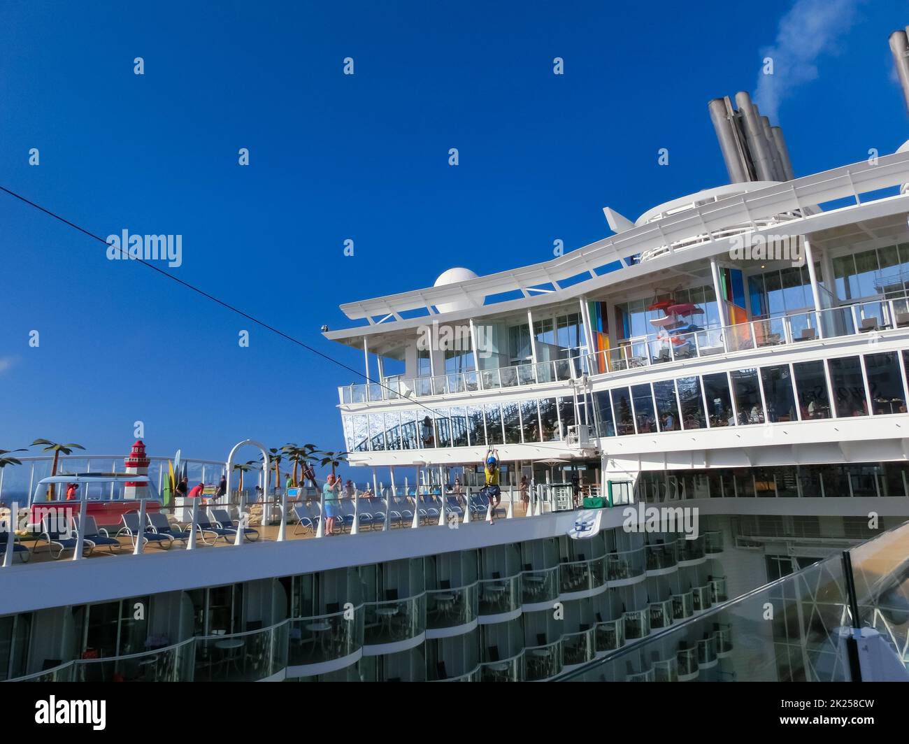 Miami, USA - April 29, 2022: The passenger at zip line at cruise liner ...