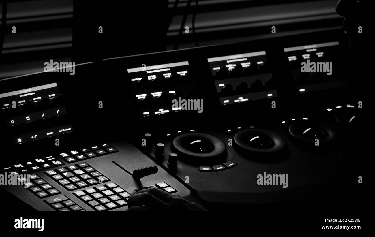 Edit video production control panel in studio. Editor editing and grade ...