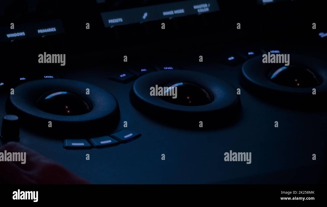Edit video production control panel in studio. Editor editing and grade ...