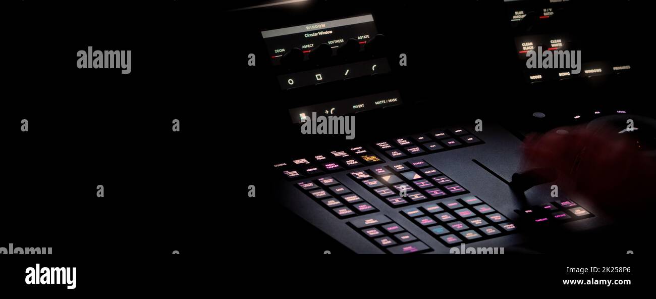 Edit video production control panel in studio. Editor editing and grade ...