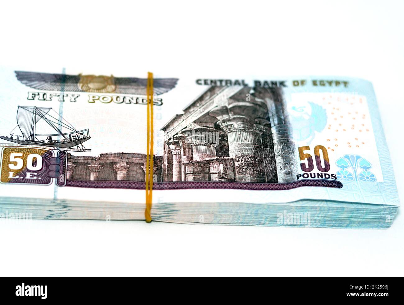 A pile of Egyptian money banknotes of 50 LE fifty pounds series 2022 ...