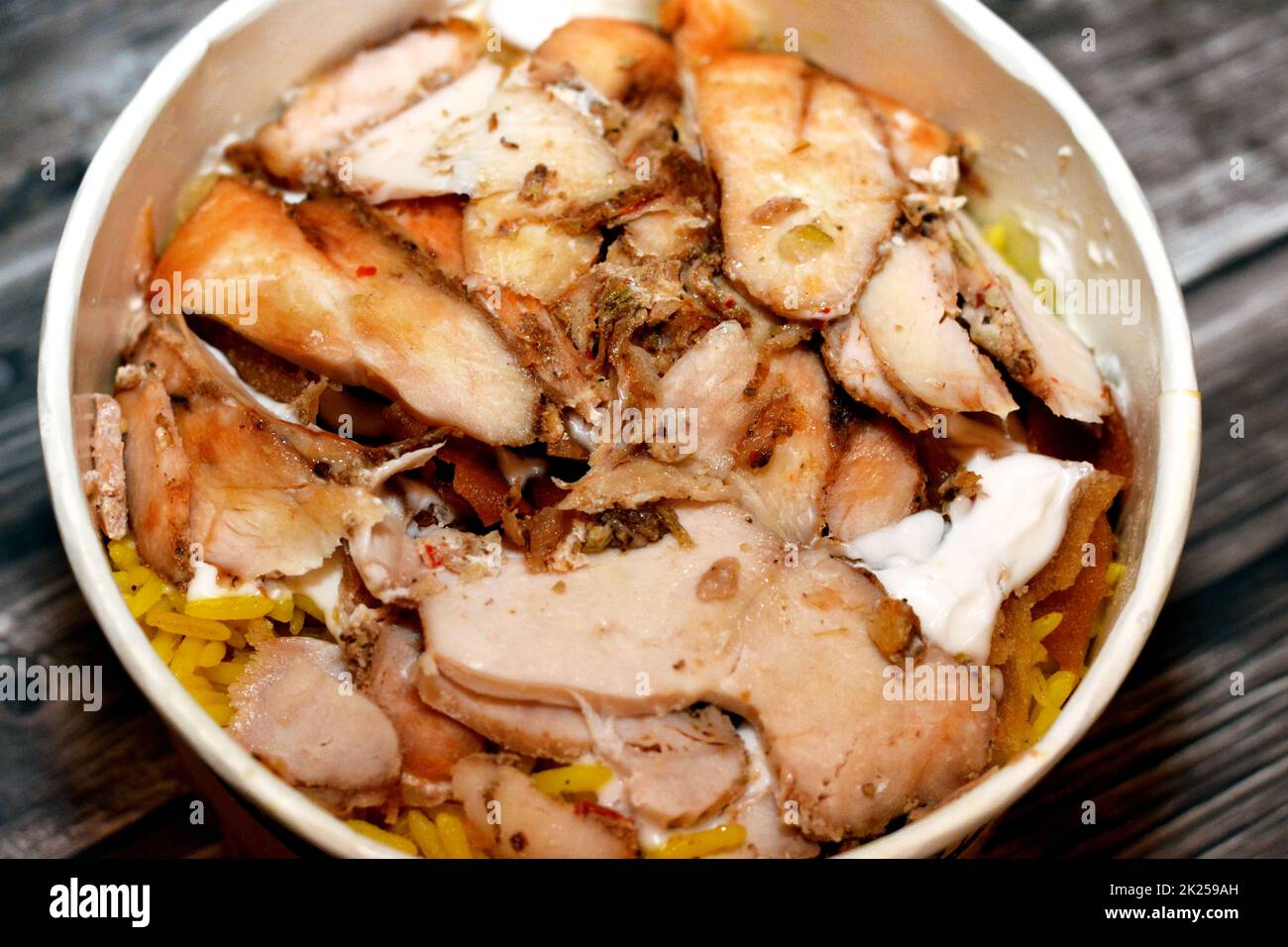 Pieces of Chicken shawarma with yellow Basmati rice, Syrian bread and ...