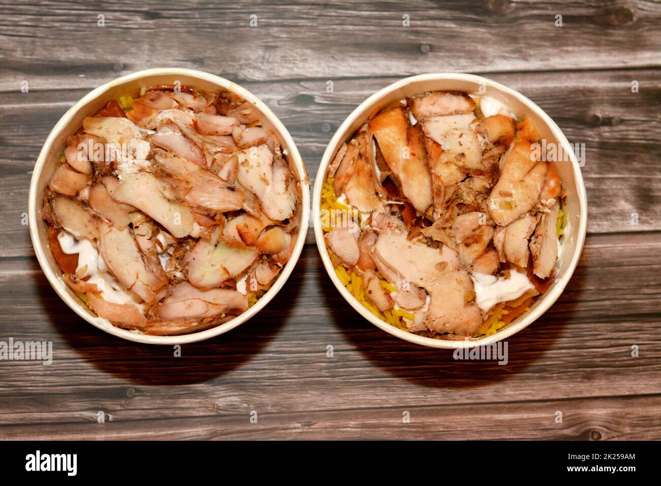 Pieces of Chicken shawarma with yellow Basmati rice, Syrian bread and ...