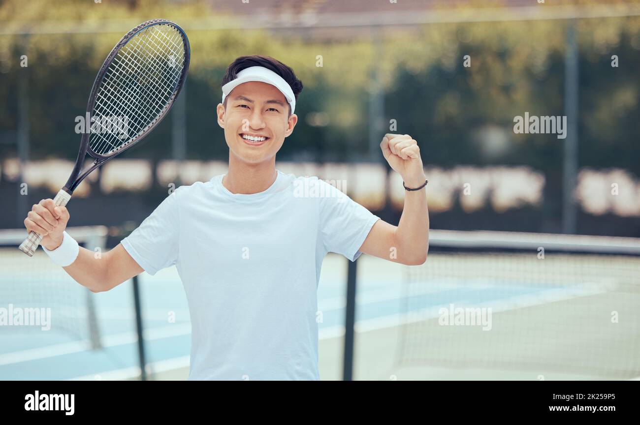 Success, tennis court and winner portrait of man with excited fist ...