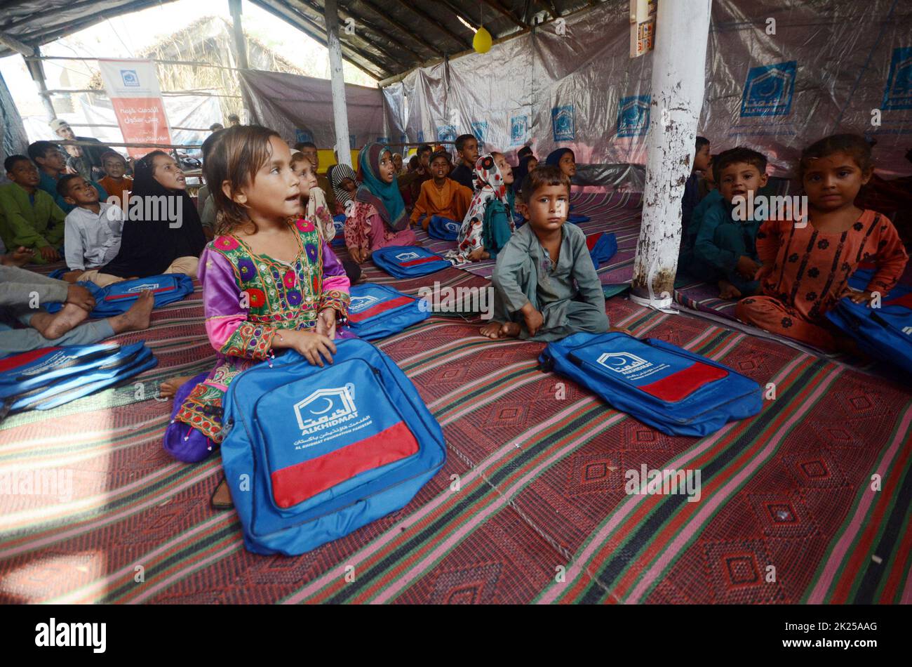 Peshawar, Pakistan. 22nd Sep, 2022. Flood-affected children attend a ...