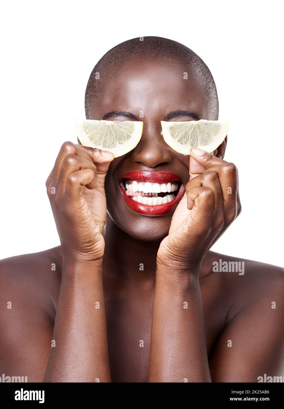Happy girls are the prettiest. Studio shot of a beautiful model holding ...