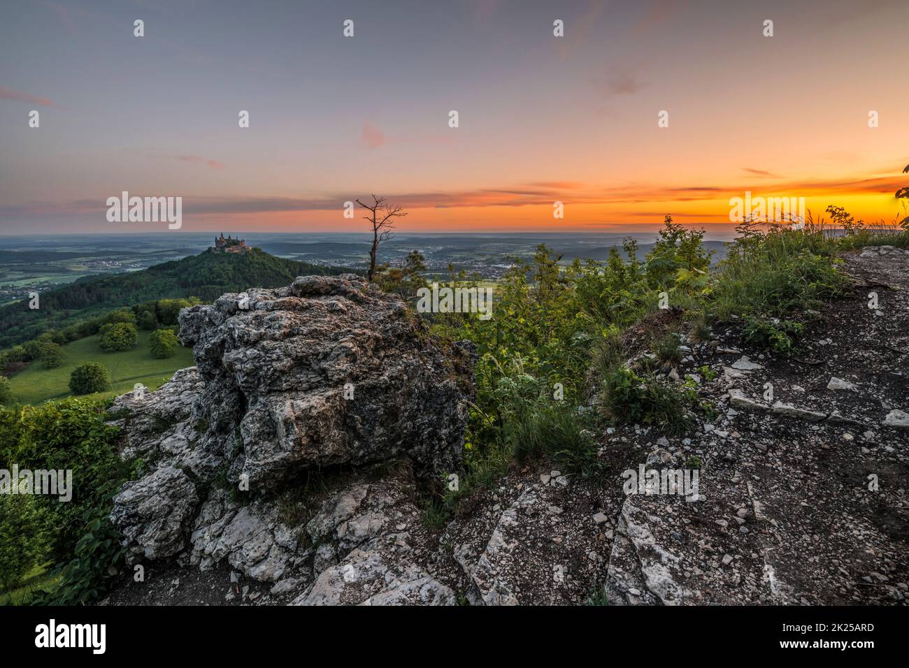 Sunrise at Zeller Horn with view to medieval knight castle Burg ...