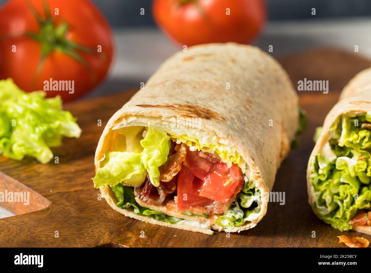 Homemade Bacon Lettuce Tomato BLT Wrap with Mayo Stock Photo - Alamy