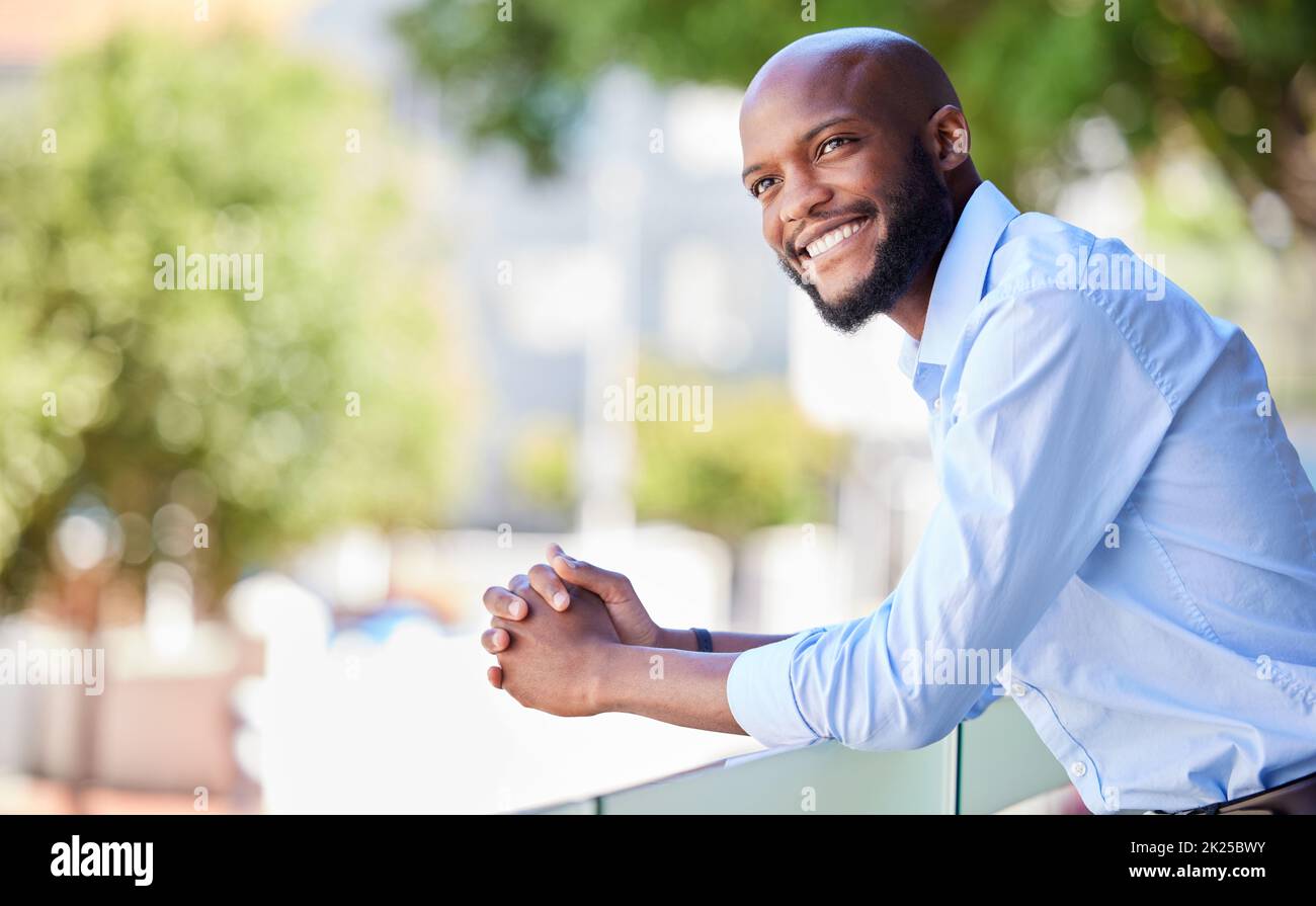 Thinking, vision and business man on balcony with idea, motivation or ...