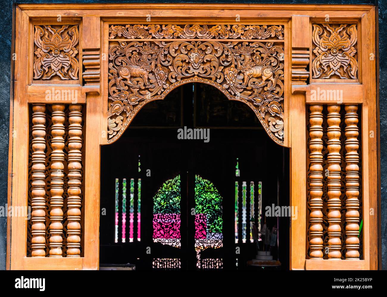 an ancient door with light and shadow in the temple (Wat Lok Moli Stock ...