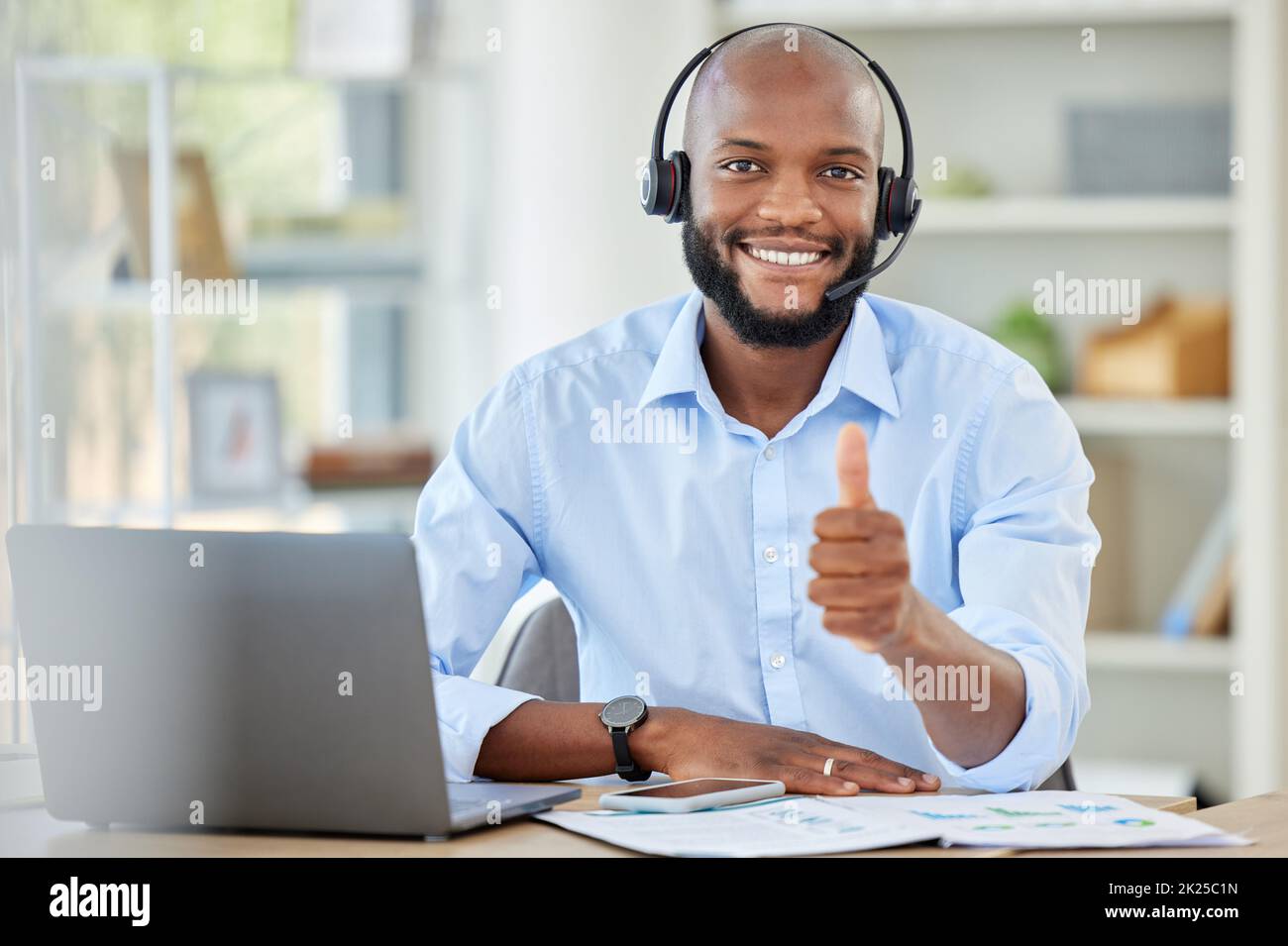 Call center office thumbs hi-res stock photography and images - Alamy
