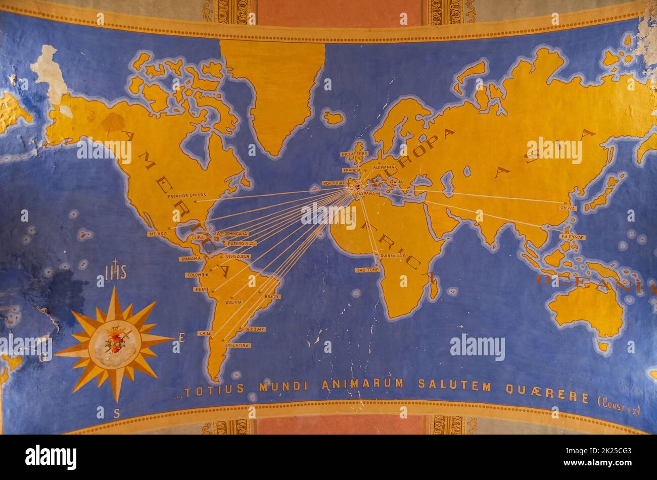 large antique map of the world in yellow and blue Stock Photo - Alamy