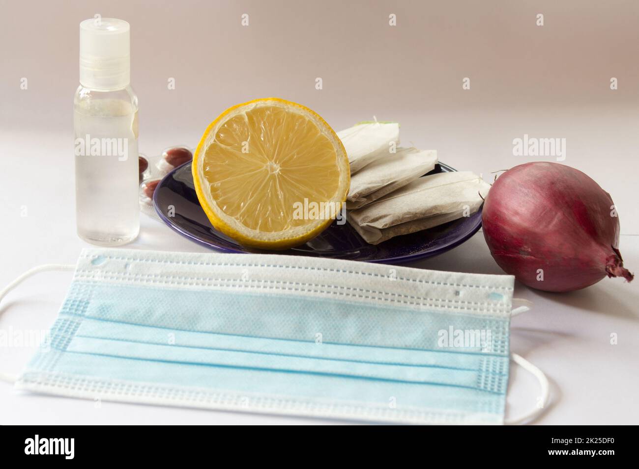 Mask lemon onion tea disinfectant - stop viruses Stock Photo - Alamy