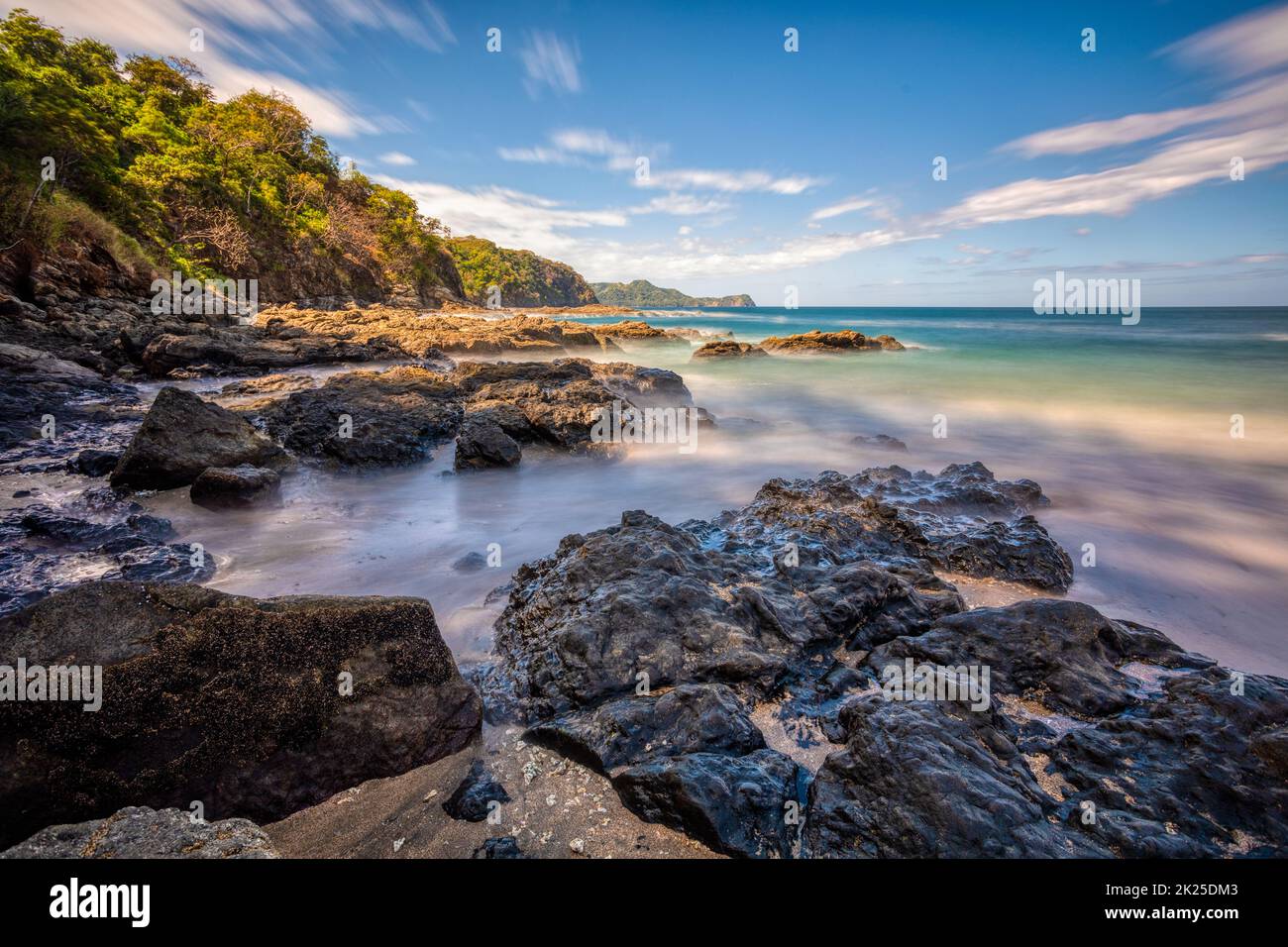 Long exposure, pacific ocean waves on rock in Playa Ocotal, El Coco ...
