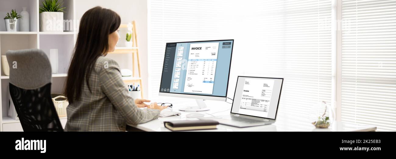 Accountant Using E Invoice Software At Computer Stock Photo - Alamy