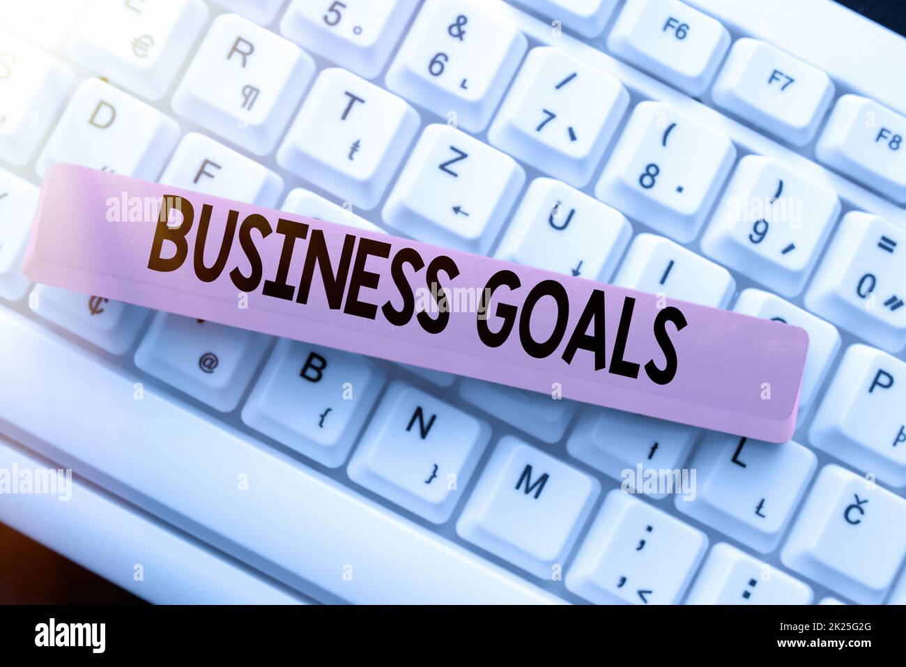 Writing displaying text Business Goals. Business showcase Expectation ...