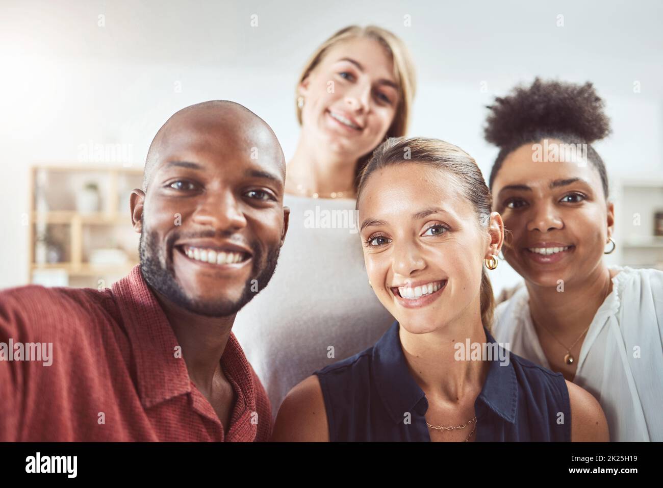 Friends, selfie and office worker smile and relax while bonding and ...