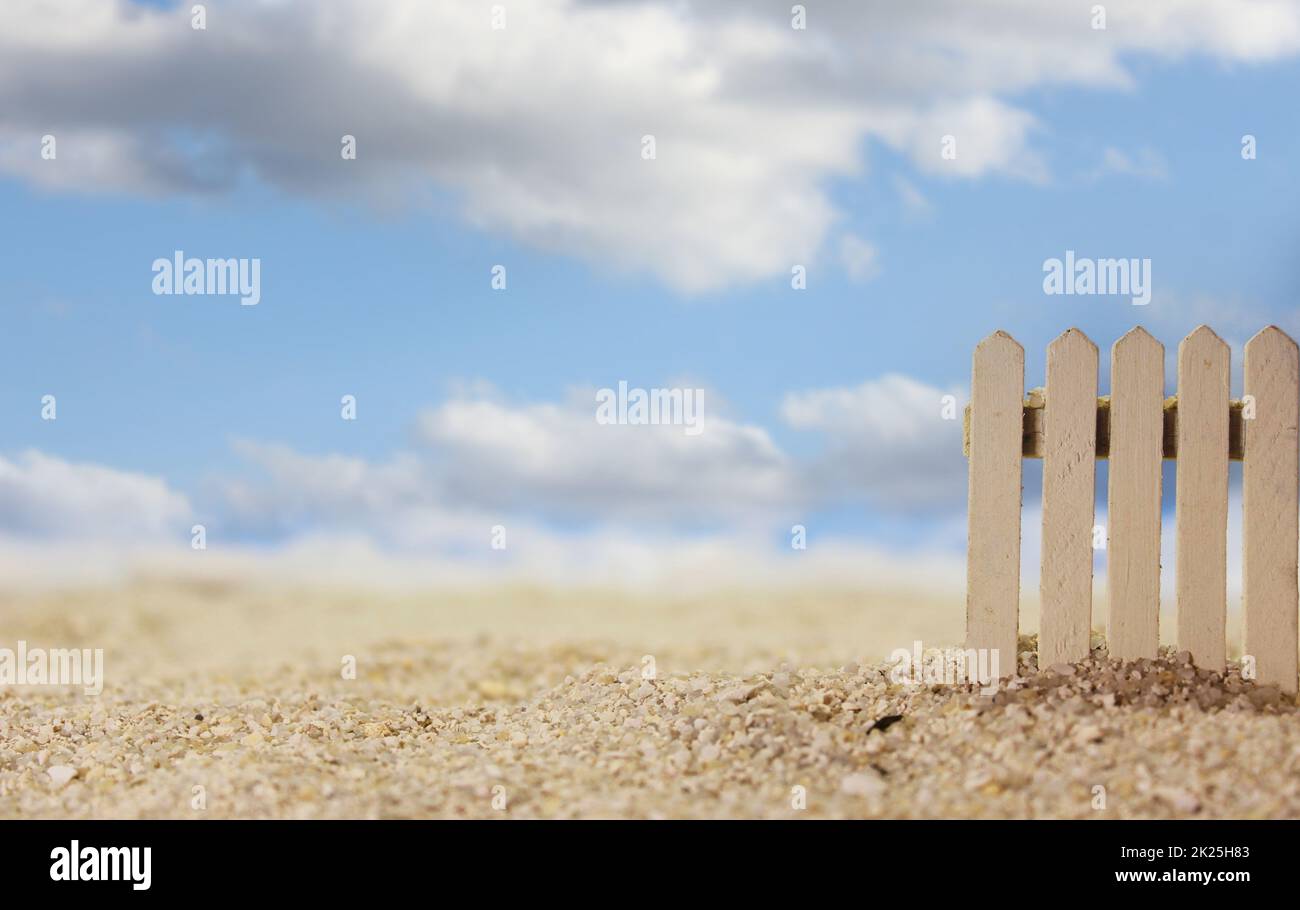 Tropical Beach with Fence and Blue Sky With Clouds Stock Photo - Alamy