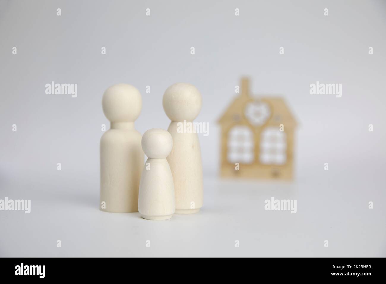 Paper figures of family near house on white background. Happy family ...