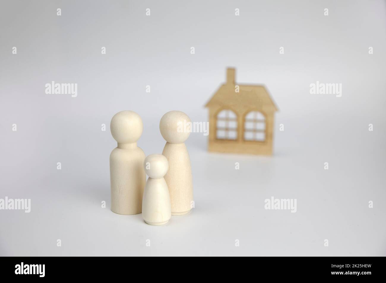 Paper figures of family near house on white background. Happy family ...
