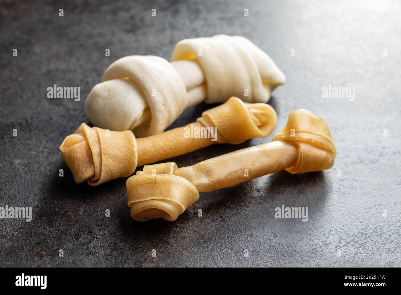 Delicacy dogs chewing bone hi-res stock photography and images - Alamy