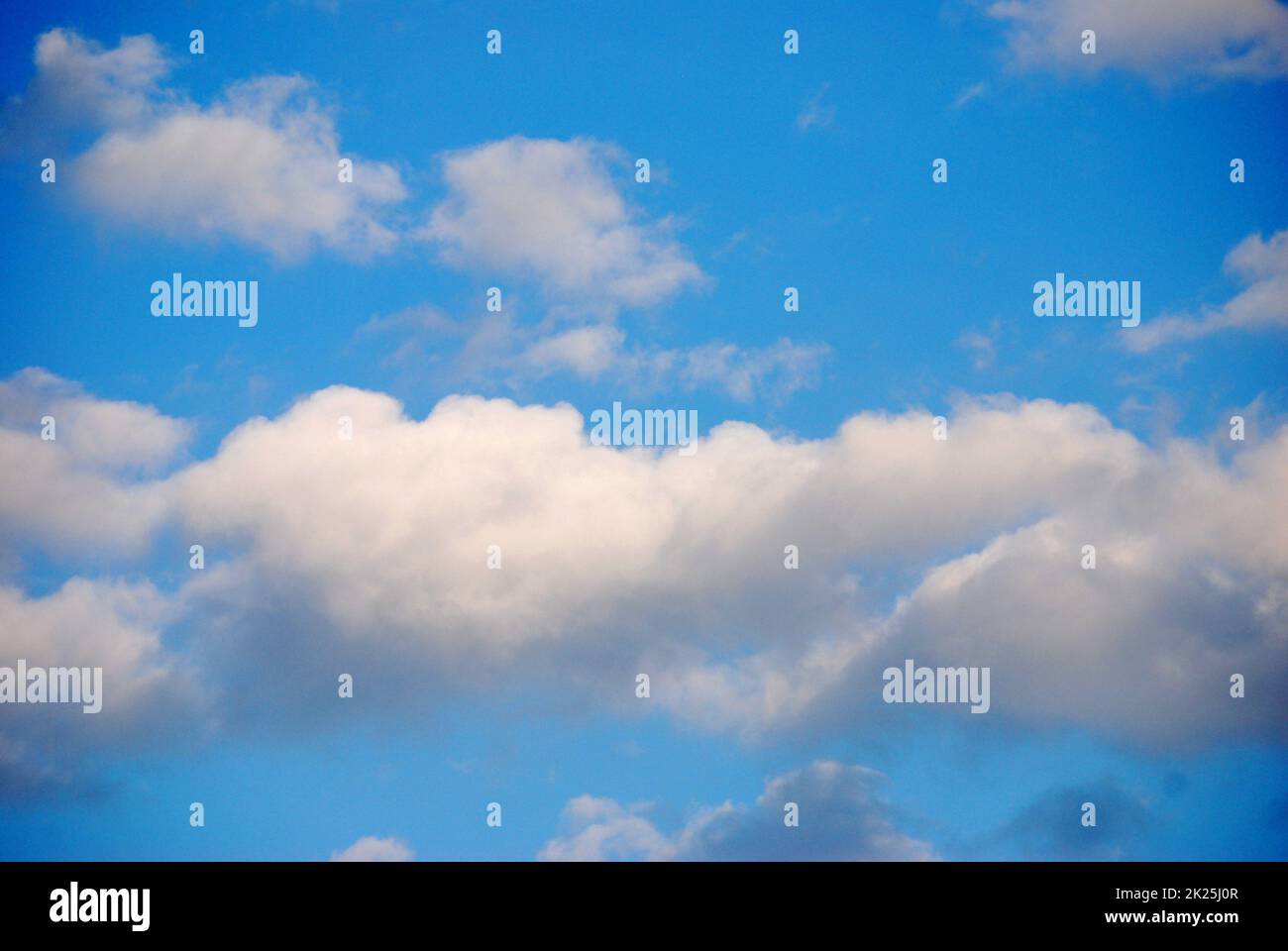Pale blue sky with clouds hi-res stock photography and images - Alamy
