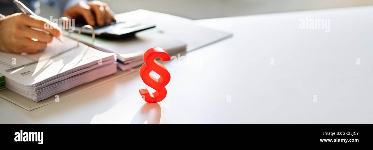 Red Paragraph And Calculator Stock Photo - Alamy