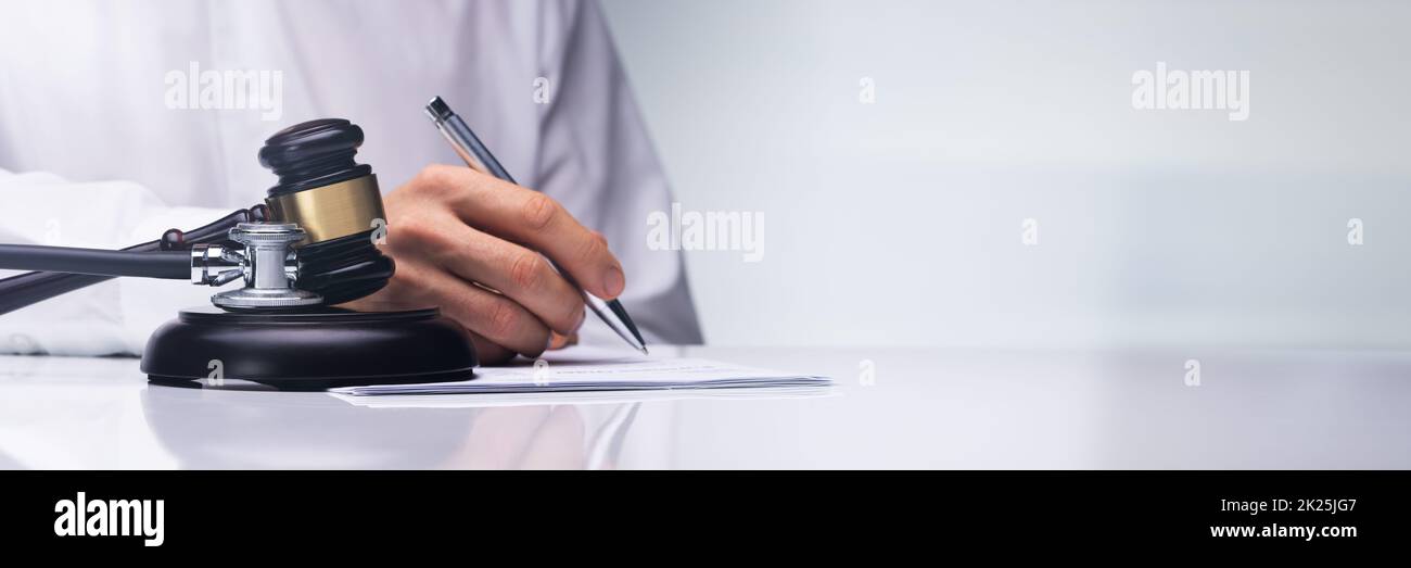 Judge Writing Criminal Order In Courtroom Stock Photo - Alamy