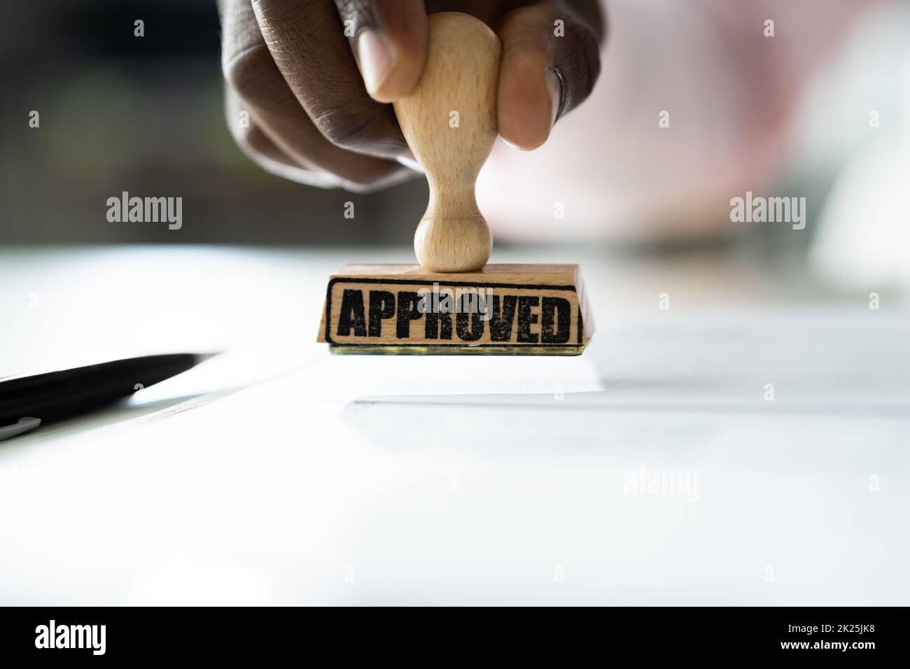 African American Black Man Using Notary Stamp Stock Photo - Alamy