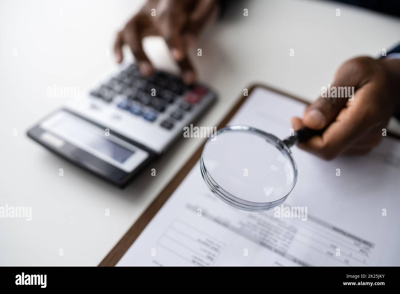 Business Fraud Investigation. Auditor Using Magnifying Glass Stock ...