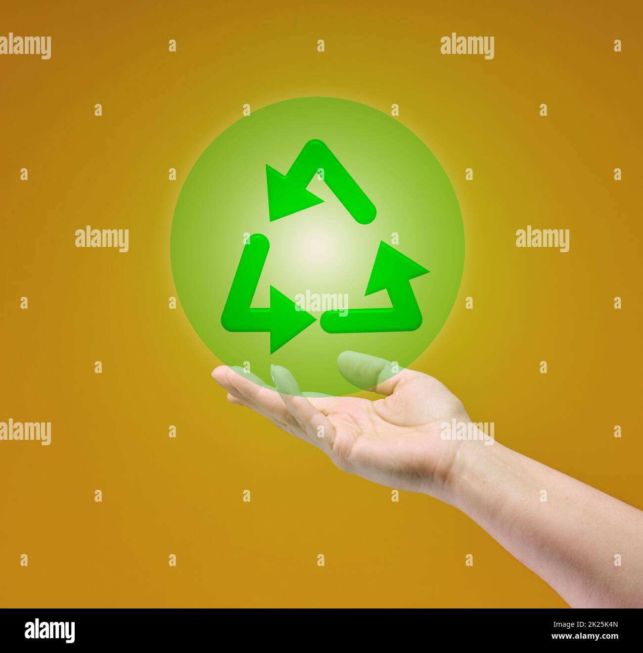 female hand holds recycling icon on yellow background. Responsible ...