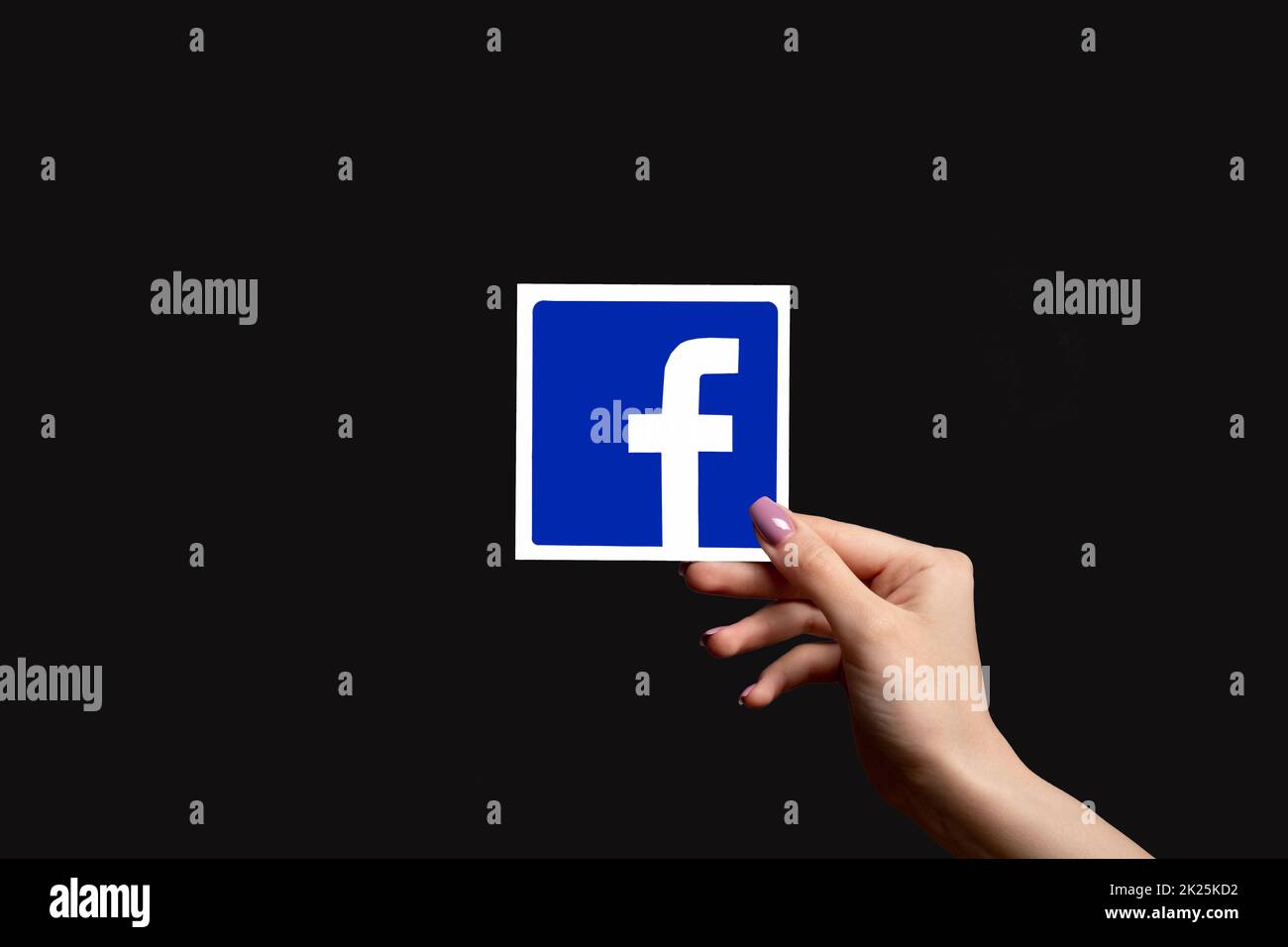 Facebook logo influencer hand mobile hi-res stock photography and ...