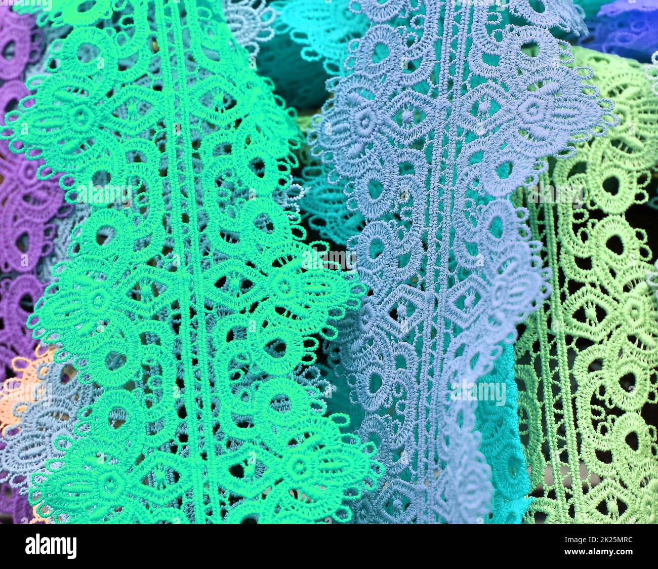 Detailed close up view on samples of cloth and fabrics in different ...