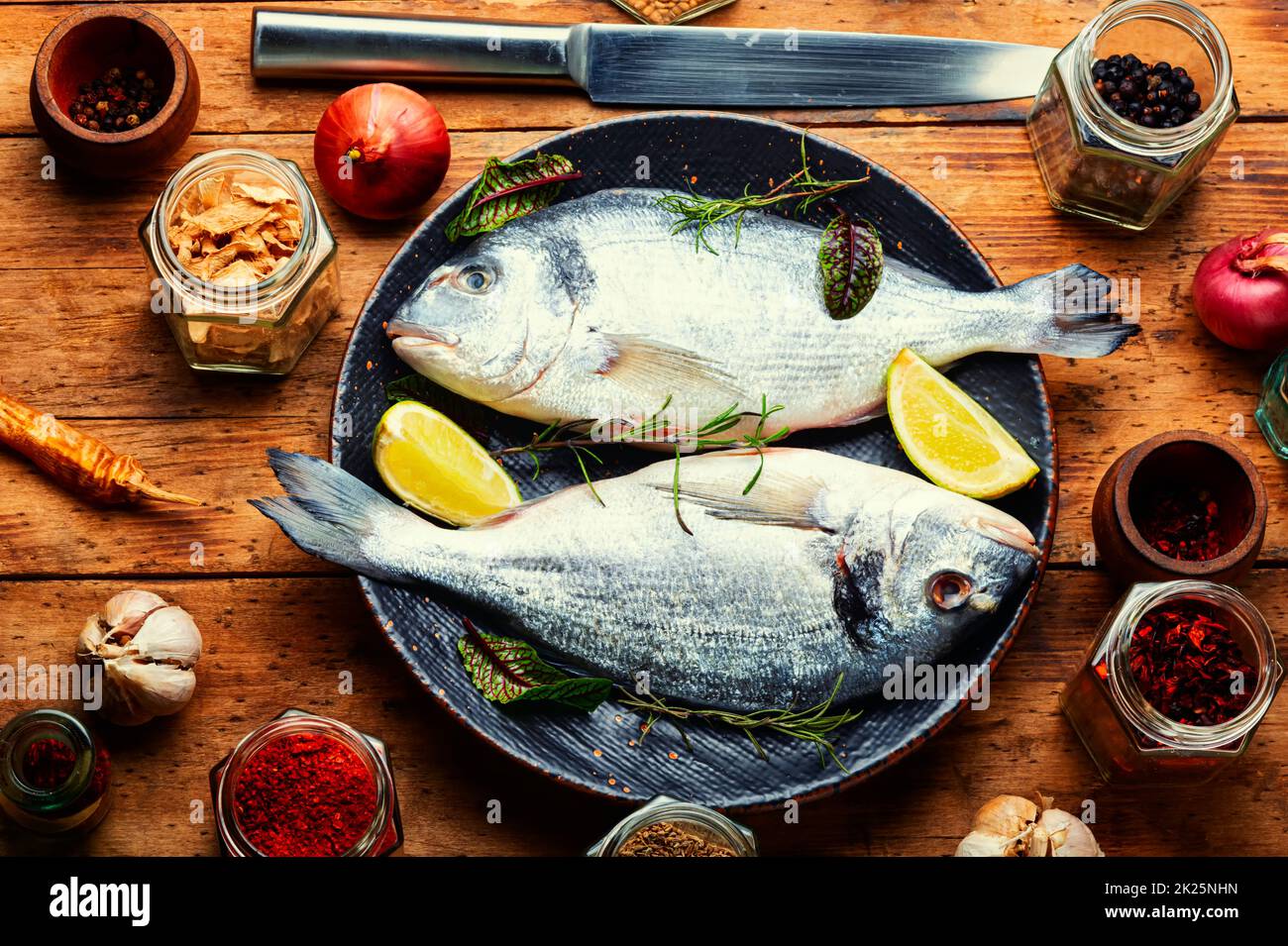 Raw uncooked seabass fish hi-res stock photography and images - Alamy