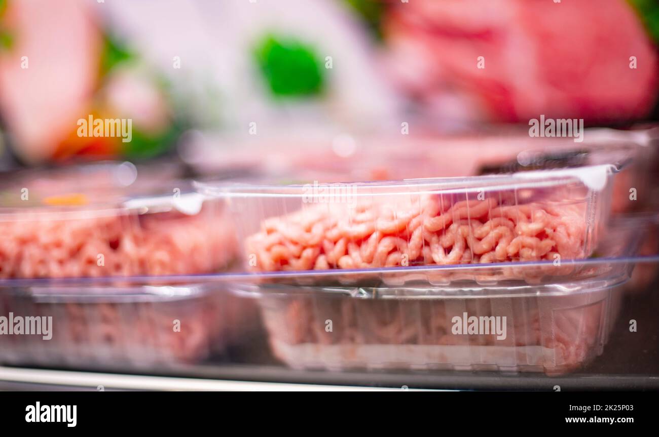 Meat products put up for sale in a supermarket commercial fridge Stock ...