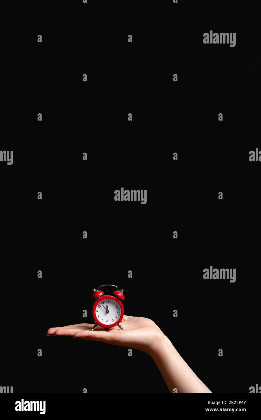 Time reminder. Late hour. Midnight alert. Procrastination delay. Woman ...