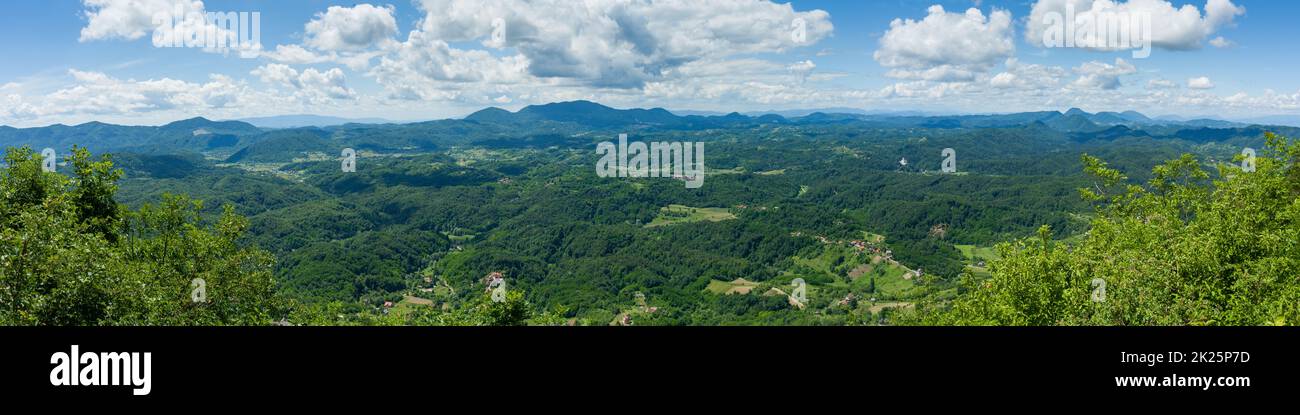Panoramic shot of forests and hills on a cloudy day Stock Photo - Alamy