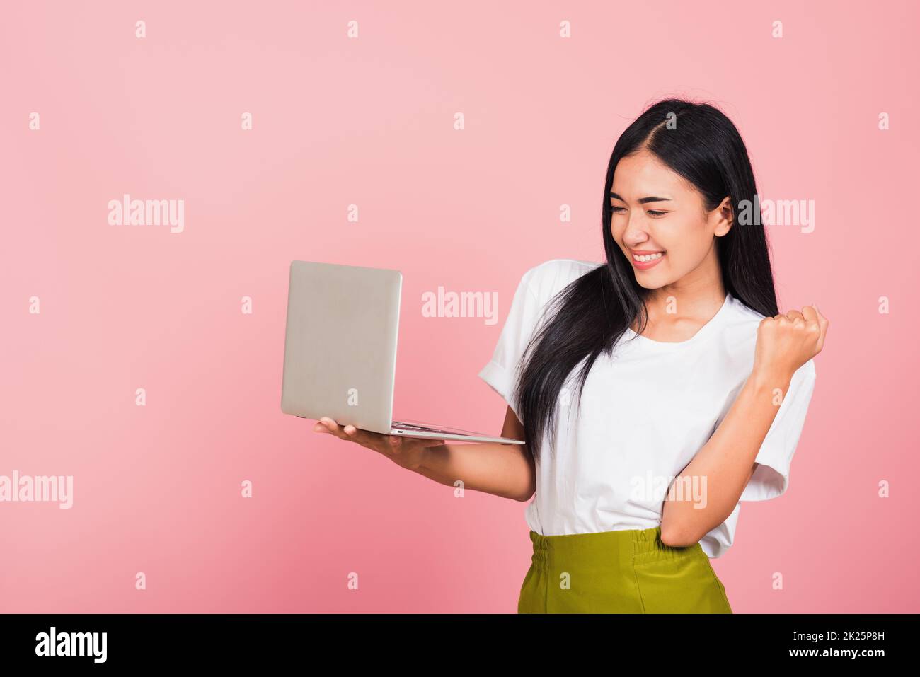 woman teen confident smiling face holding using laptop computer and ...