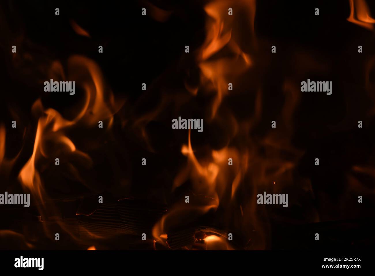 Cozy and warming log fire in the fireplace, in the province of Alicante ...