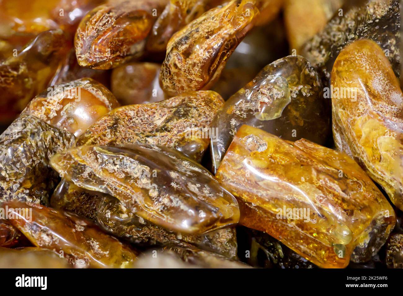 Amber in its natural form and warm color. Amber is often processed into ...