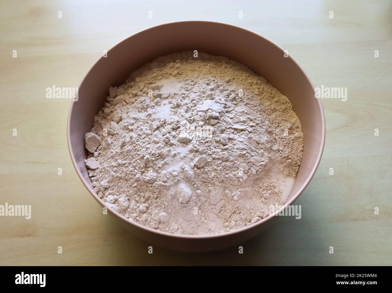 Fresh wheat flour in a light bowl taken from above Stock Photo - Alamy