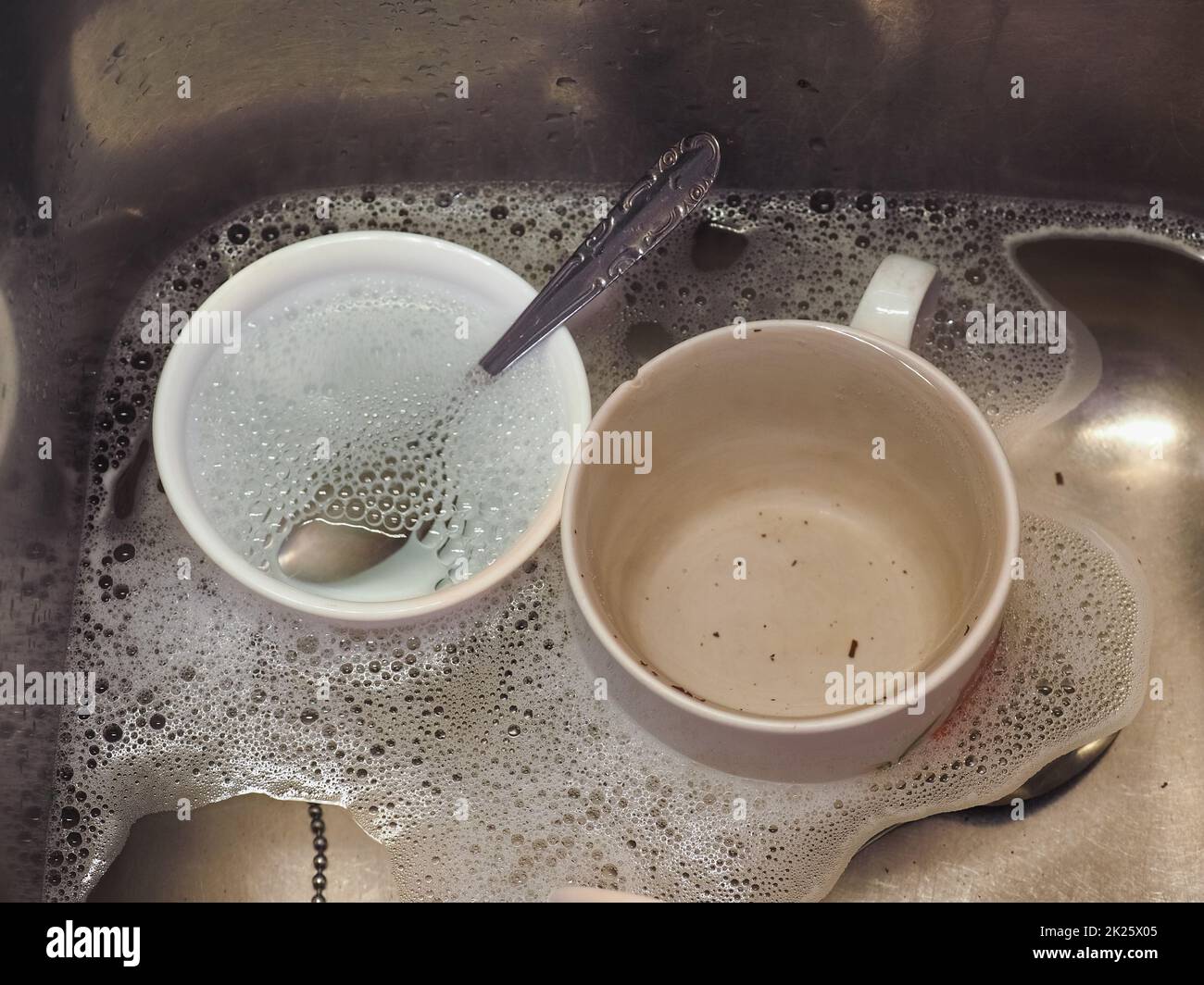 Washing cups hi-res stock photography and images - Alamy
