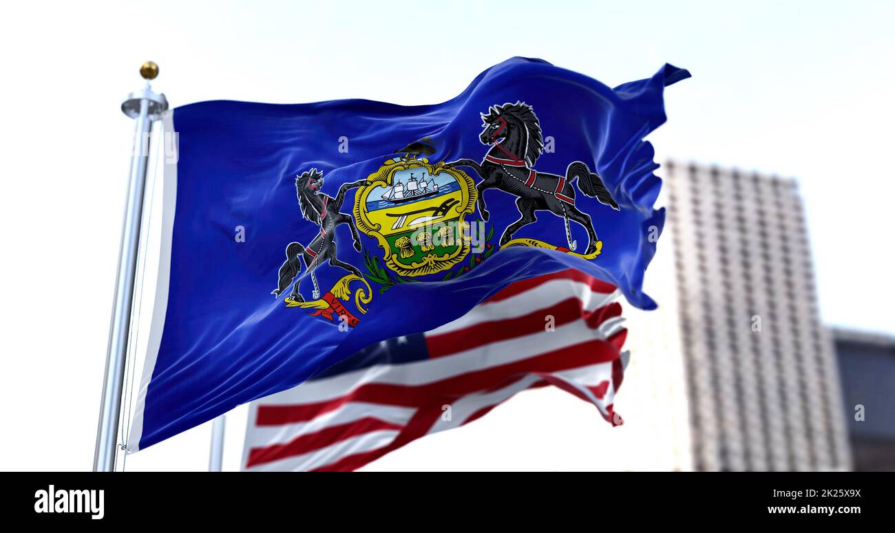 the flag of the US state of Pennsylvania waving in the wind Stock Photo ...