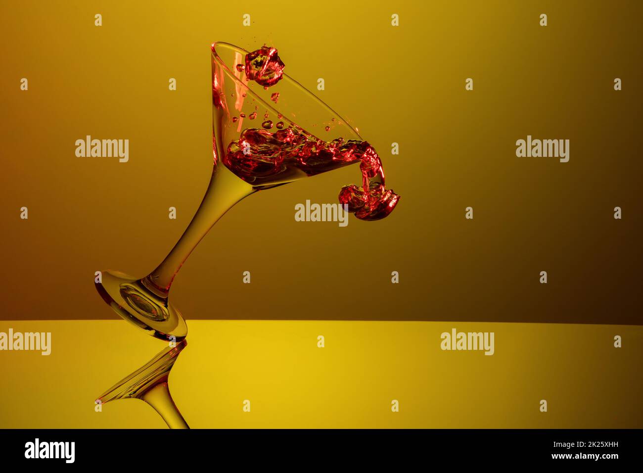 The falling glass Stock Photo - Alamy
