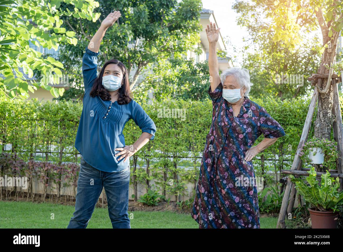 Asian senior or elderly old lady woman patient exercise with happy ...